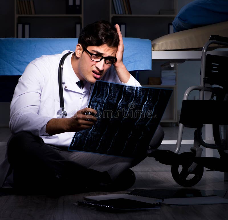 Doctor Working Night Shift in Hospital after Long Hours Stock Image ...
