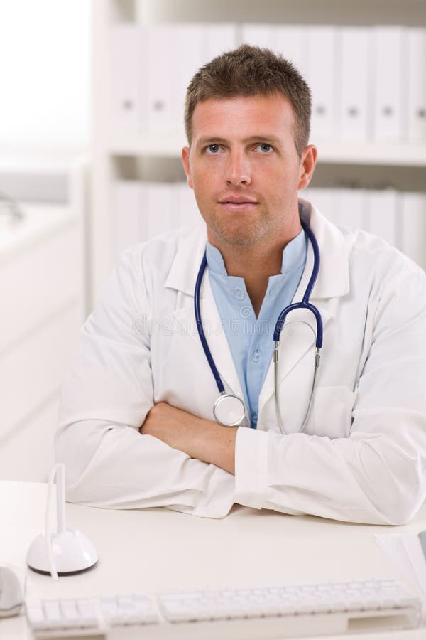Doctor working at office stock image. Image of adult, exam - 7777759