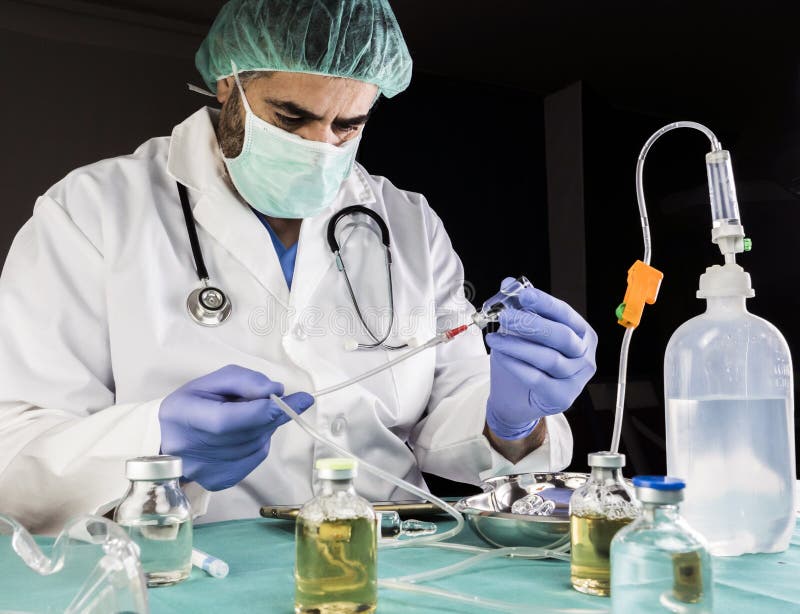 Doctor Working with Samples and Vials in a Clinical Laboratory Stock ...