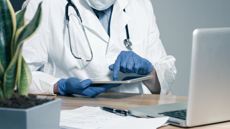 Doctor using tablet stock photo. Image of doctor, female - 181918252