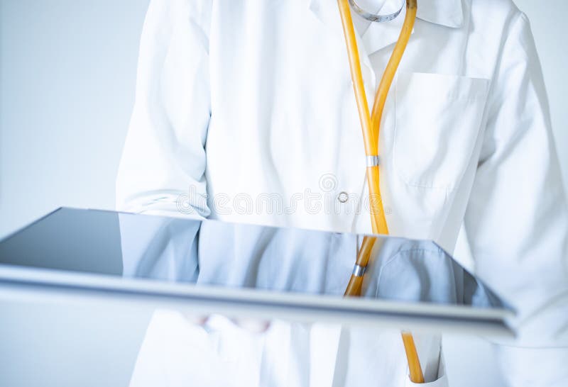 Doctor Working on Tablet Medical Care Stock Image - Image of digital ...