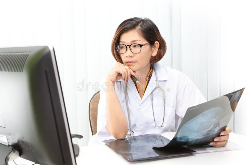 Doctor Working by Watching To Computer Monitor Stock Photo - Image of ...