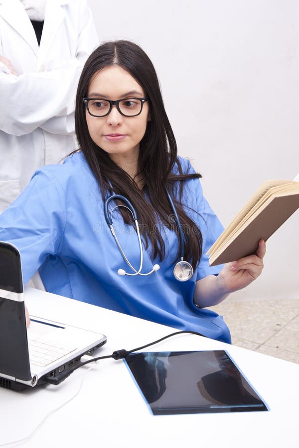 Doctor working stock photo. Image of people, adult, desk - 69107076