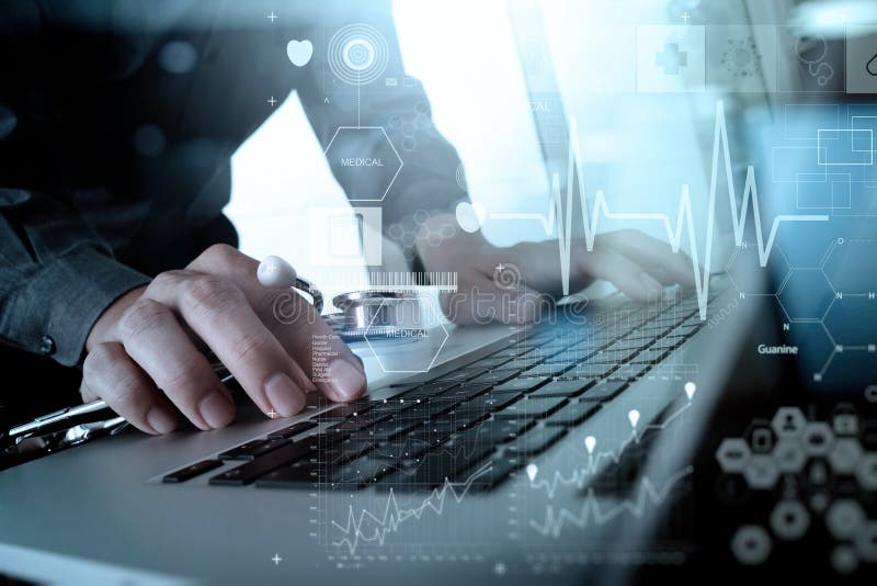 Doctor Working at Workspace with Laptop Computer in Medical Work Stock ...