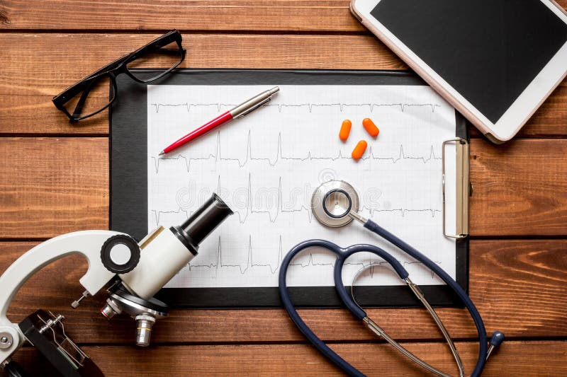Doctor Workplace at Wooden Table in Lab Top View Stock Photo - Image of ...