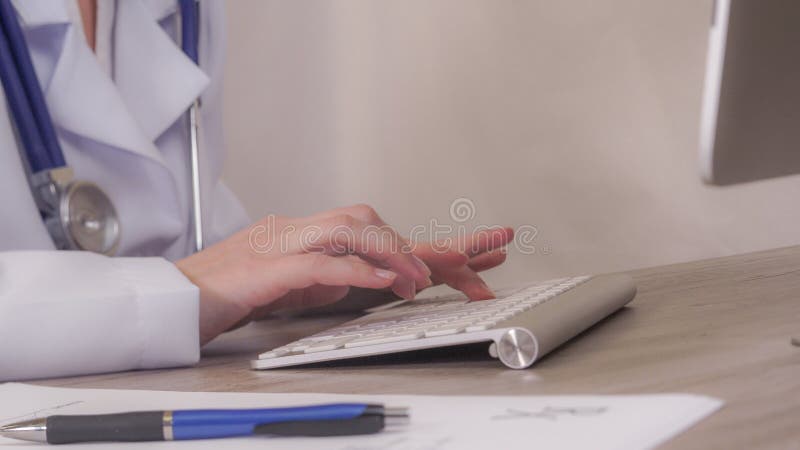 The Doctor Works at the Computer Stock Image - Image of pretty, doctor ...