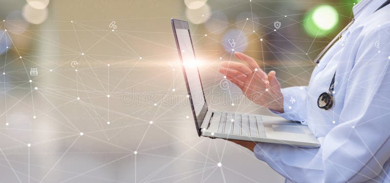 The Doctor Works Online with a Laptop in His Hands Stock Photo - Image ...