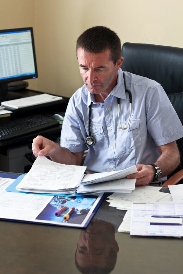 Doctor Writing on a Document Stock Image - Image of handwriting, people ...