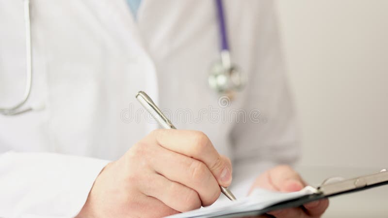 Doctor Writing Patient Notes on a Medical Test Stock Video - Video of ...