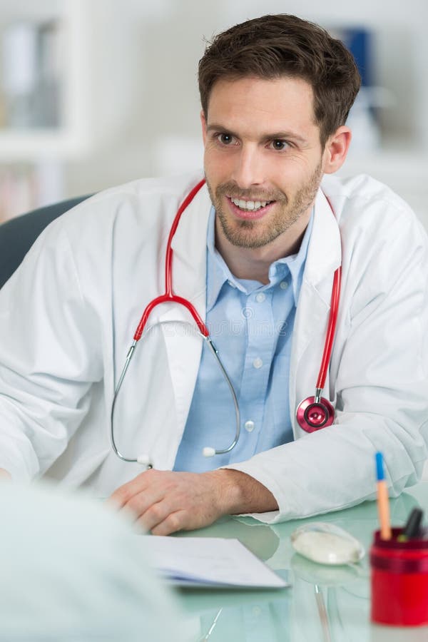 Doctor Writing Prescription at Desk Stock Image - Image of help, medic ...
