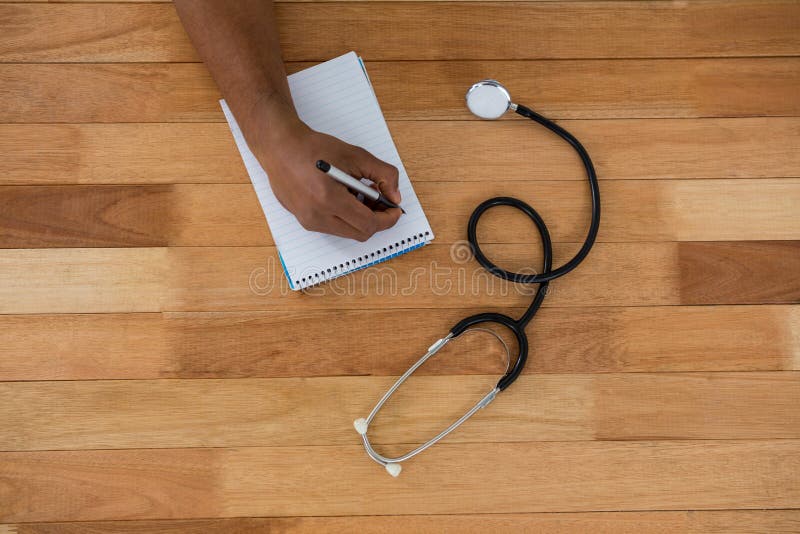Doctor Writing Prescription on Notepad Stock Image - Image of doctor ...