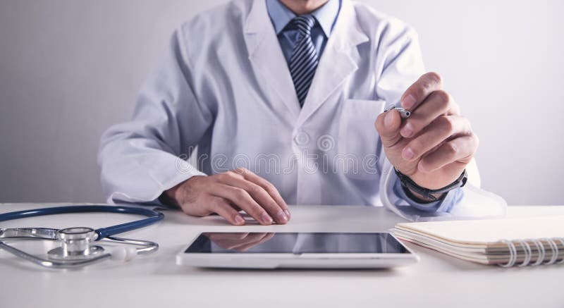 Doctor Writing Something in the Screen with a Pen Stock Photo - Image ...