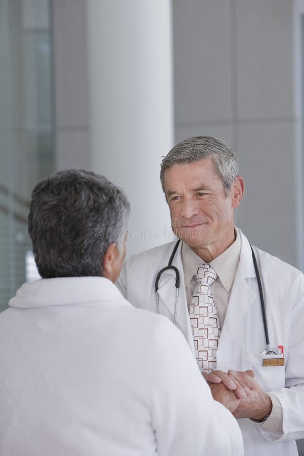 Doctor y paciente foto de archivo. Imagen de médico, retrato - 10470784
