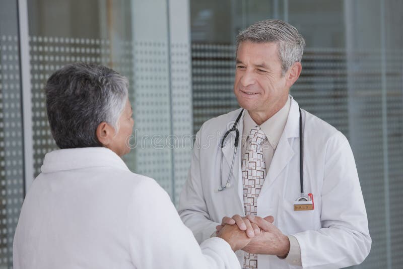 Doctor y paciente foto de archivo. Imagen de medicina - 10470824