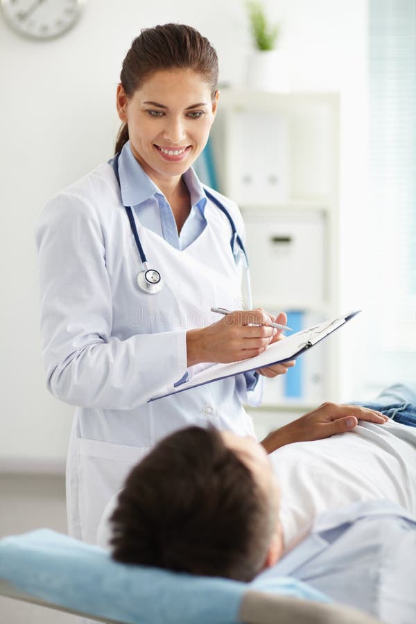 Doctor y paciente foto de archivo. Imagen de persona - 27879364