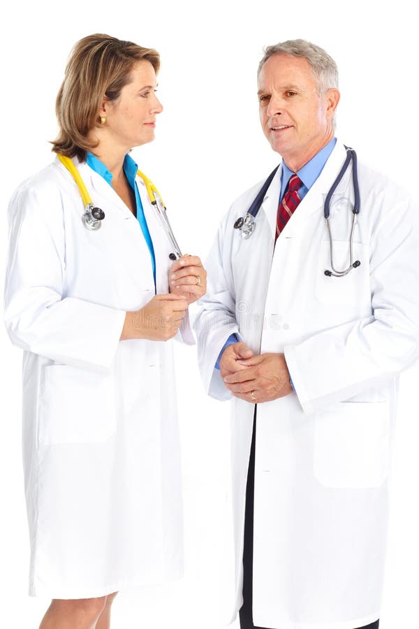 Doctors Review a Chart stock photo. Image of consultation - 1078710