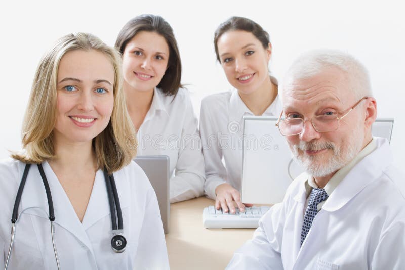 Doctors Attending To a Patient Stock Photo - Image of beautiful, sick ...