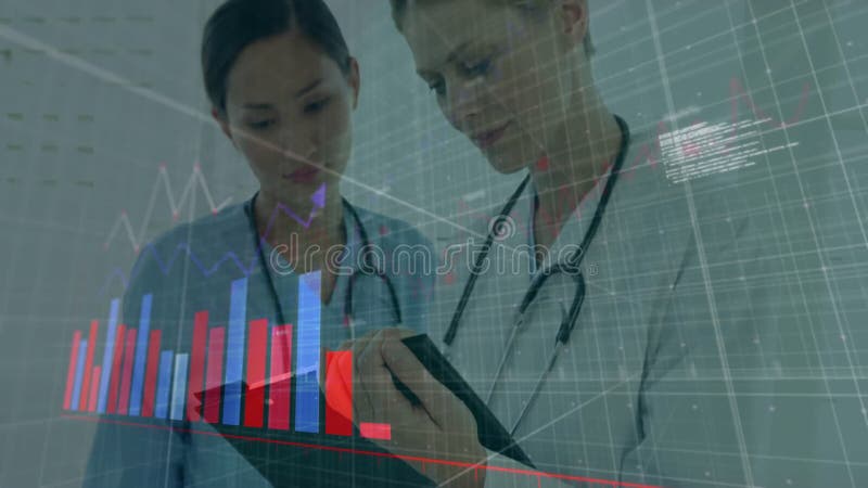 Doctors Analyzing Data on Tablet Over Financial Graphs and Charts ...