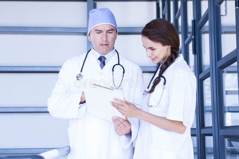 Doctors Checking a Medical Report Stock Image - Image of confidence ...