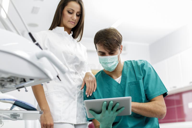Dentist with Team for Training in the Dental Clinic Stock Photo - Image ...