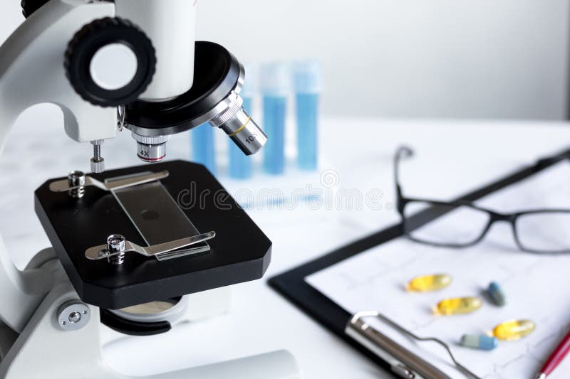 Doctors Desk with Microscope and Test Tubes Stock Image - Image of ...