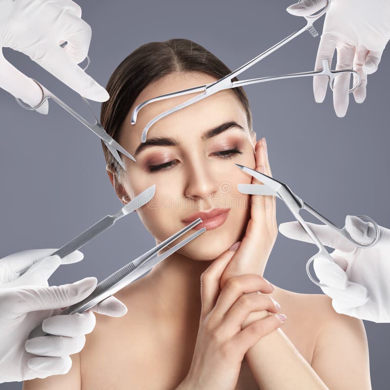 Doctors with Different Instruments and Young Woman on Grey Background ...