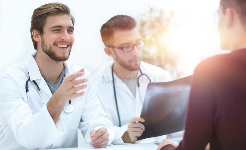 Doctors Discuss with the Patient the X-ray Stock Image - Image of ...