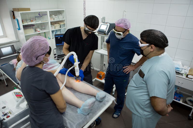 Surgeons Surgeons Doing Leg Surgery Stock Image - Image of vascular ...