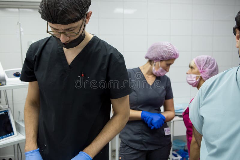 Surgeons Surgeons Doing Leg Surgery Stock Image - Image of catheter ...