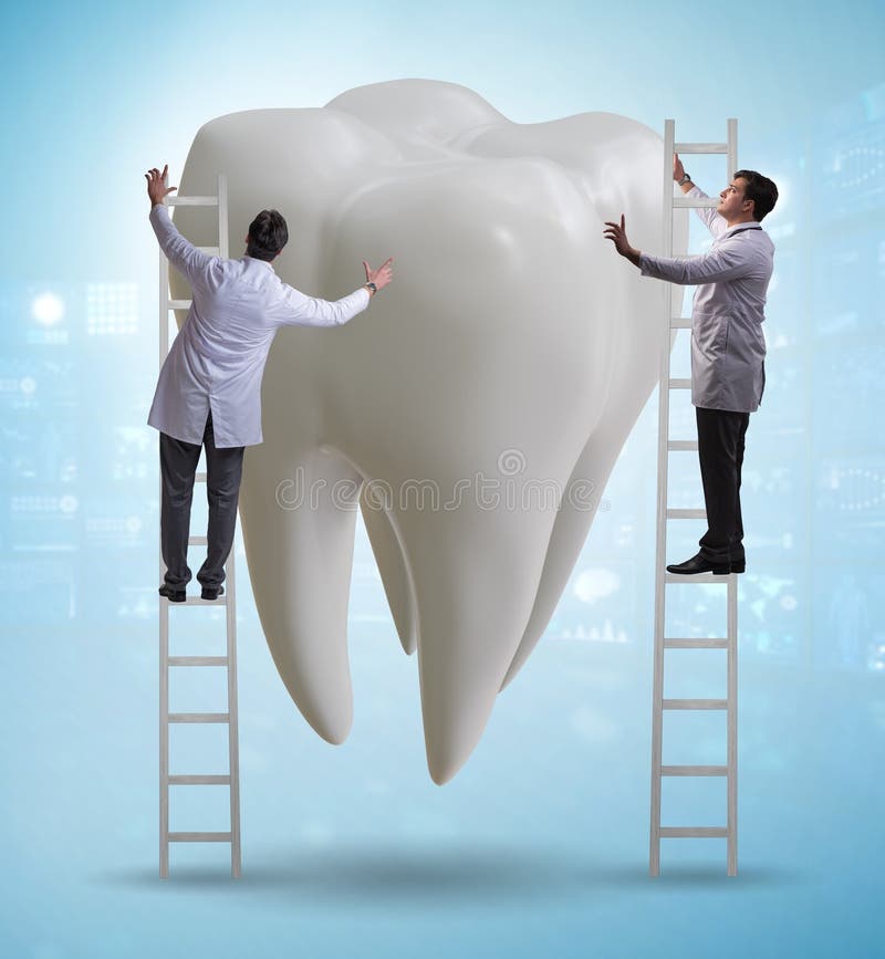 Doctors Examining Giant Tooth in Dental Concept Stock Photo - Image of ...