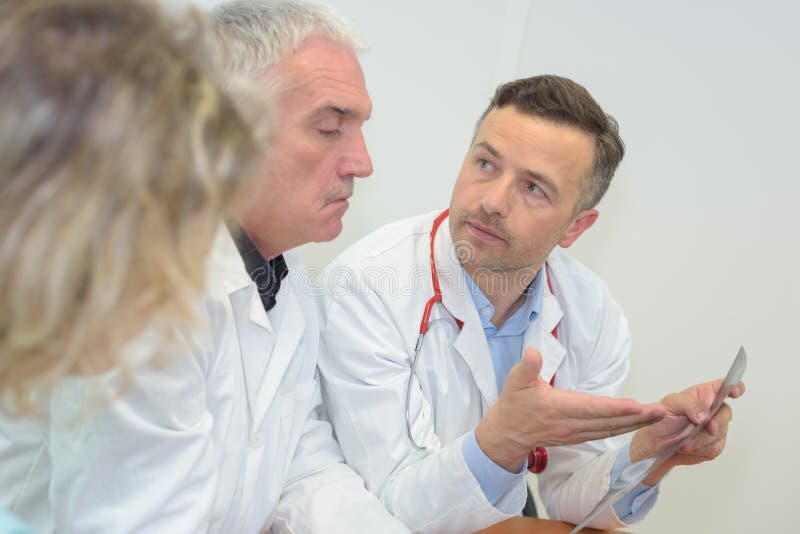 Doctors Having a Conversation Stock Photo - Image of communication ...