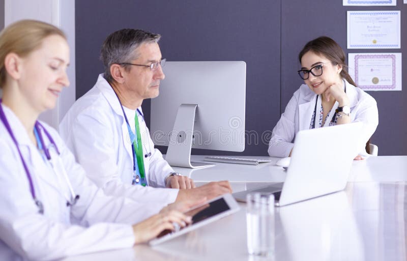Doctors Having a Medical Discussion in a Meeting Room Stock Image ...