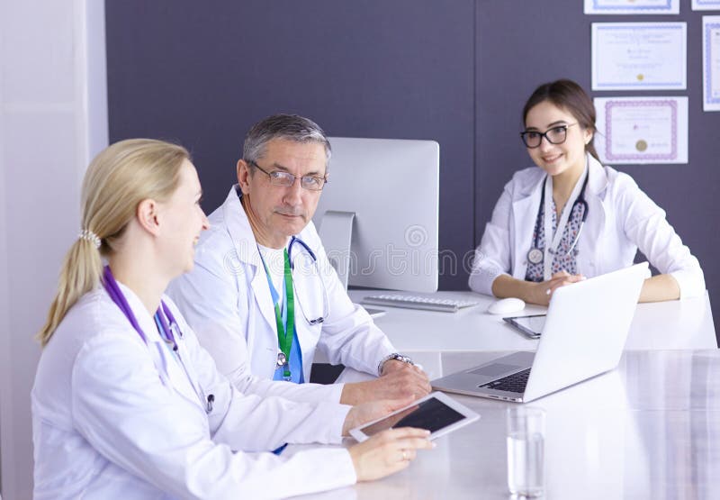 Doctors Having a Medical Discussion in a Meeting Room Stock Image ...