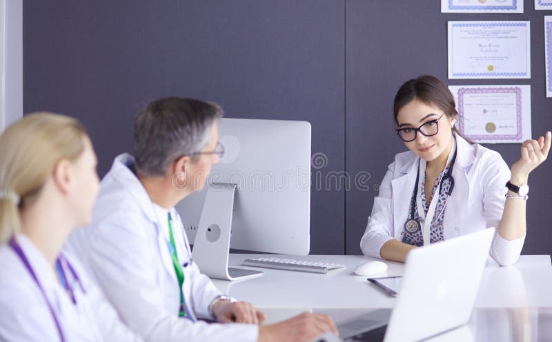 Doctors Having a Medical Discussion in a Meeting Room Stock Photo ...
