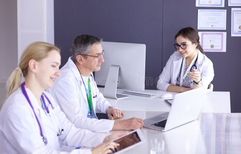 Doctors Having a Medical Discussion in a Meeting Room Stock Photo ...