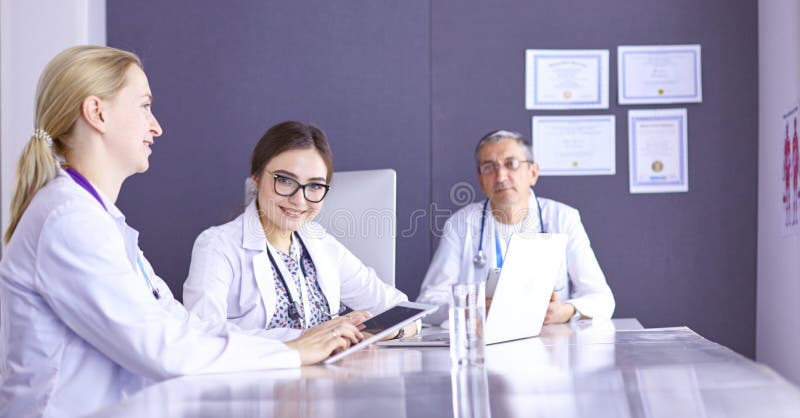 Doctors Having a Medical Discussion in a Meeting Room Stock Image ...