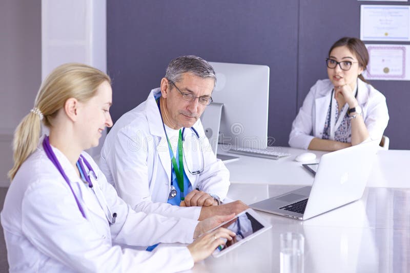 Doctors Having a Medical Discussion in a Meeting Room Stock Photo ...