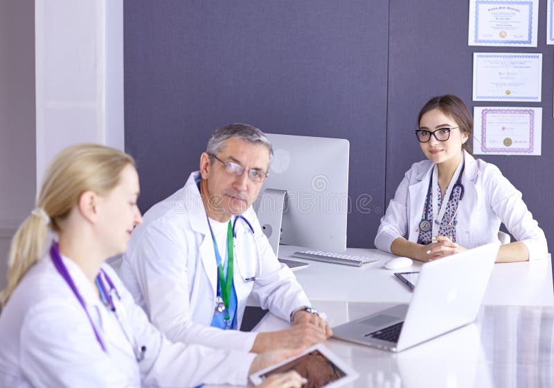 Doctors Having a Medical Discussion in a Meeting Room Stock Photo ...