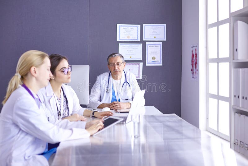 Doctors Having a Medical Discussion in a Meeting Room Stock Photo ...