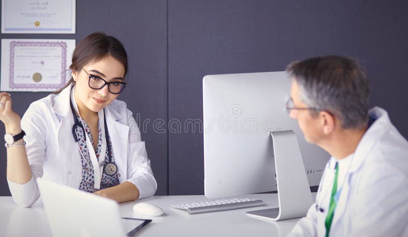 Doctors Having a Medical Discussion in a Meeting Room Stock Image ...