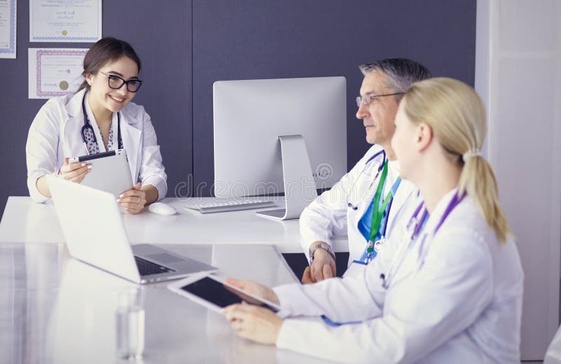 Doctors Having a Medical Discussion in a Meeting Room Stock Image ...