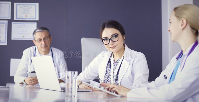 Doctors Having a Medical Discussion in a Meeting Room Stock Image ...