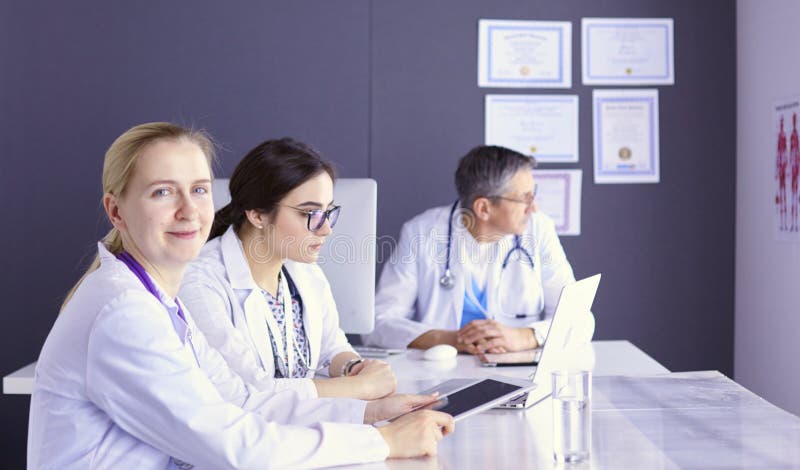 Doctors Having a Medical Discussion in a Meeting Room Stock Photo ...