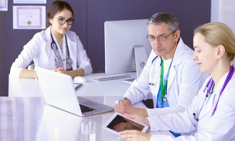 Doctors Having a Medical Discussion in a Meeting Room Stock Photo ...