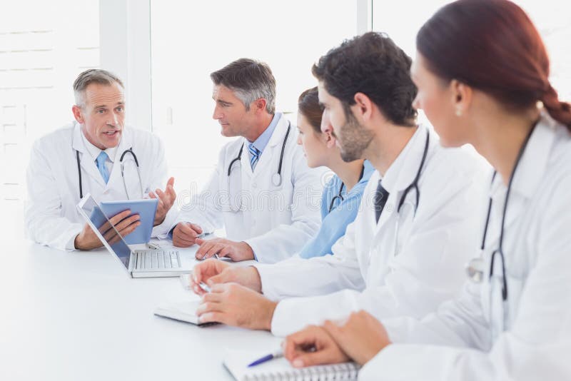 Doctors Having A Medical Discussion Stock Photo - Image of woman ...