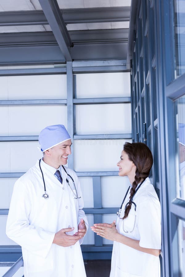 Doctors Interacting with Each Other Stock Image - Image of clinic, care ...