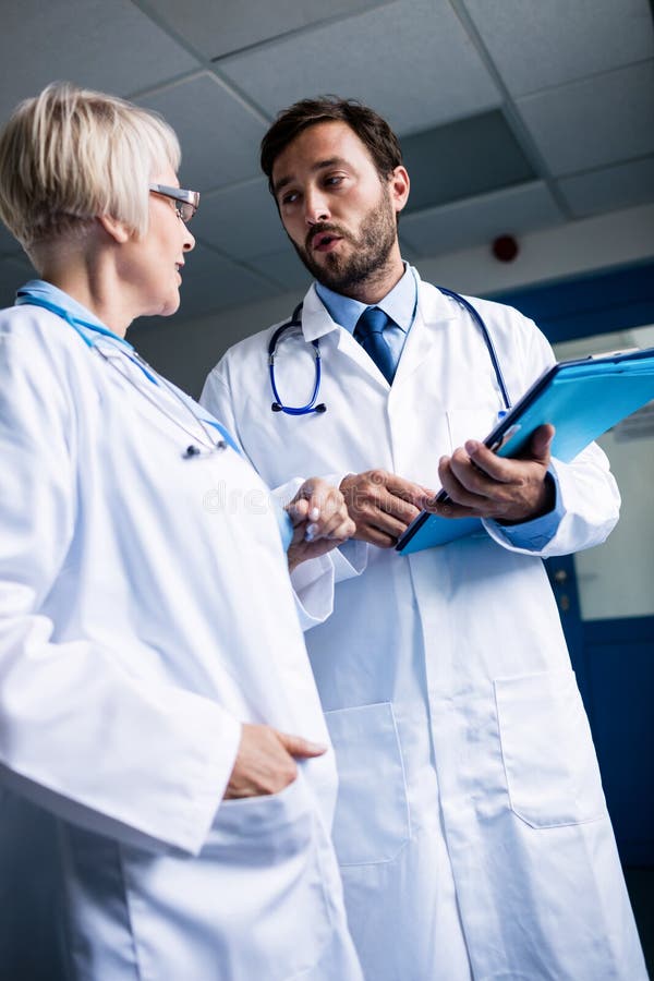 Doctors Interacting with Each Other Stock Image - Image of medical ...