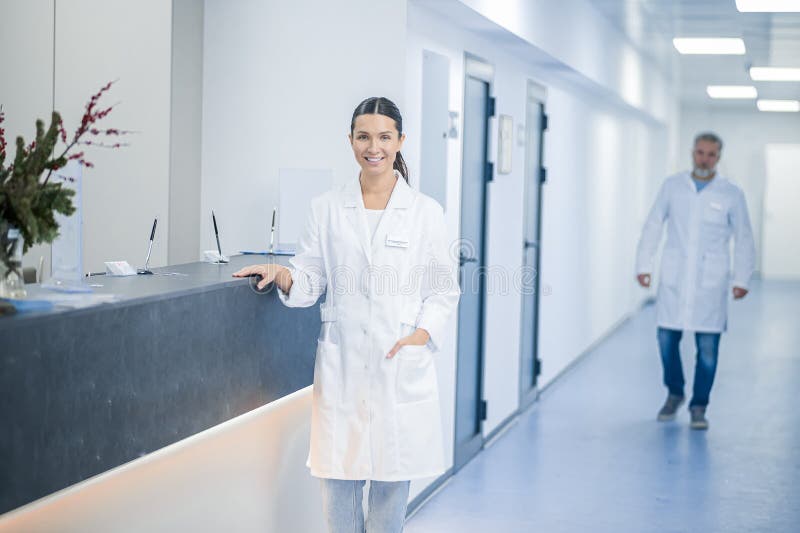 Doctors in Lab Coats in the Clinic Corridor Stock Photo - Image of ...