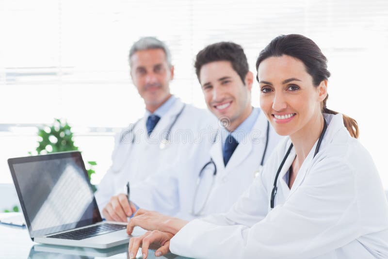 Doctor Using Laptop and Electronic Medical Record System Stock Image ...