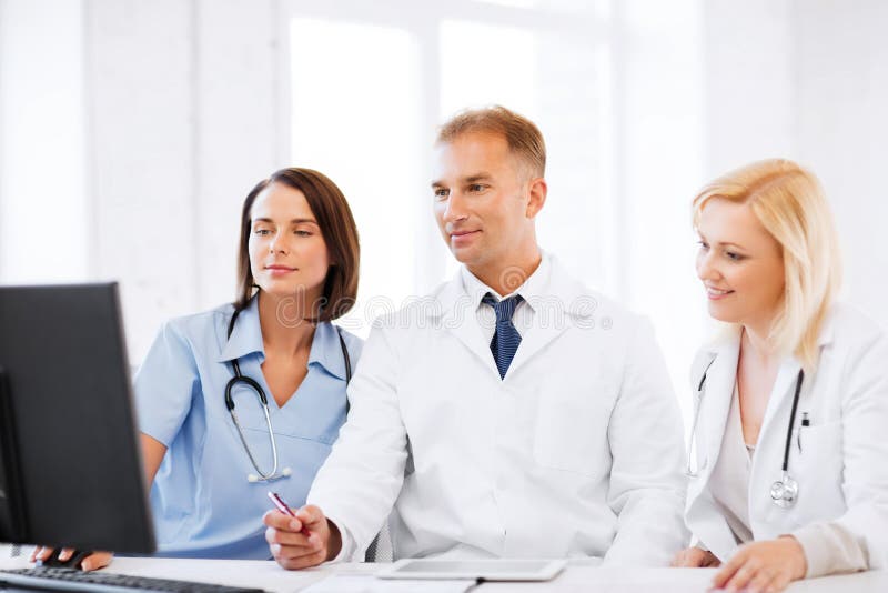 Doctors Looking at Computer on Meeting Stock Image - Image of hospital ...